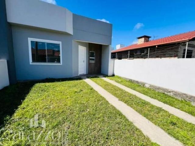 Casa geminada com 03 dormitórios