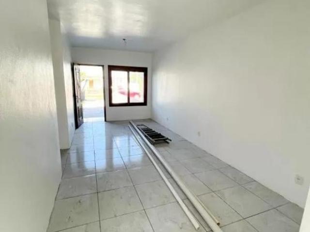 Casa geminada com 02 dormitórios