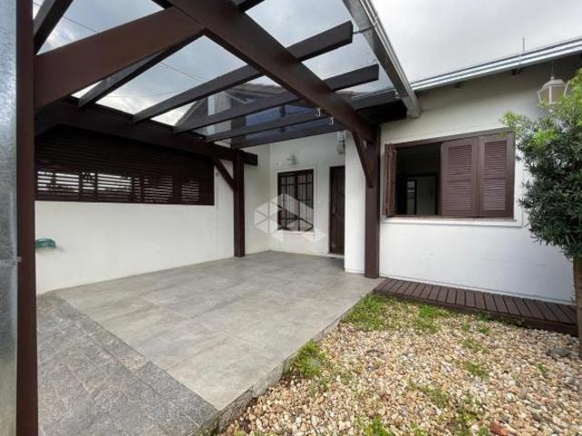 Casa geminada com 2 dormitórios, no loteamento Motocross, Arroio Grande