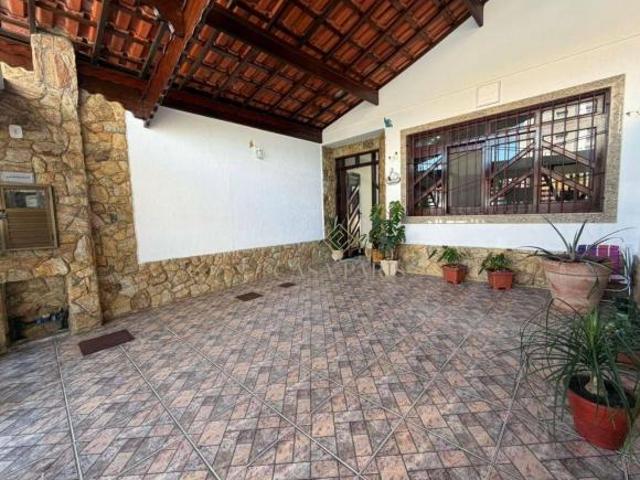 Casa geminada com 2 dormitórios à venda, 101 m² por R$ 530.000 Jardim Real Praia Grande/SP