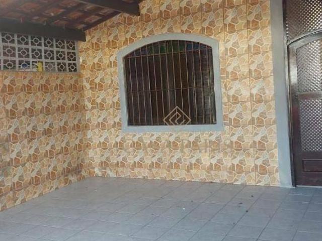Casa geminada com 2 dormitórios à venda, 116 m² por R$ 478.000 Maracanã Praia Grande/SP