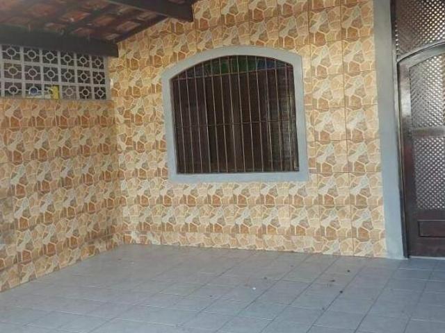 Casa geminada com 2 dormitórios à venda, 116 m² por R$ 478.000 Maracanã Praia Grande/SP