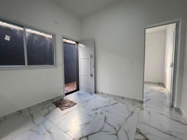 Casa geminada com 2 dormitórios à venda, 72 m² por R$ 730.000,00 Vila Guilhermina Praia Grande/S