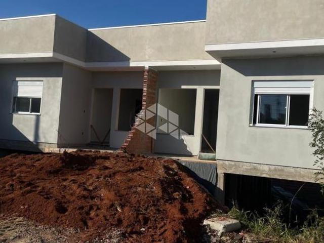Casa Geminada com 2 Dormitórios e Porão à Venda na João Alves