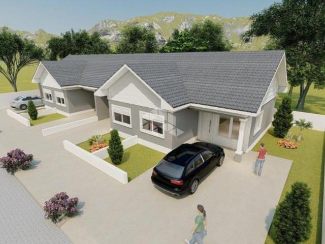 Casa geminada com 2 dormitórios em Linha Santa Cruz