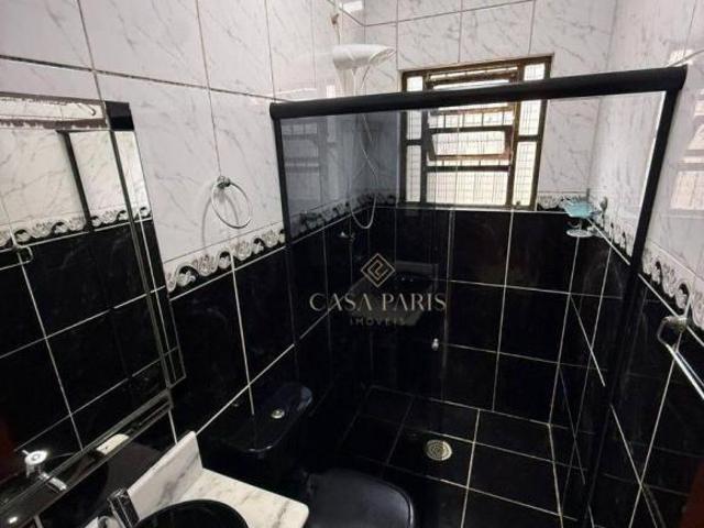 Casa geminada com 2 dormitórios, 2 vagas e área gourmet à venda, 80 m² por R$ 490.000 Ocian Prai