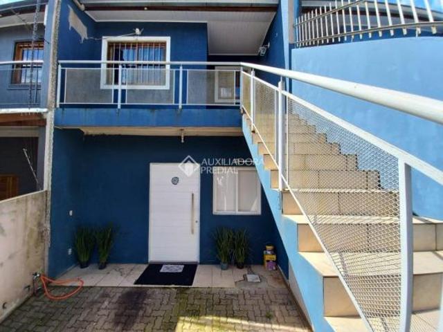 Casa geminada com 2 quartos, pátio, piscina no Bairro Campestre em São Leopoldo