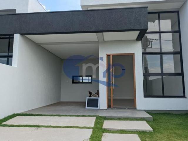 Casa geminada com 3 dormitorios no Loteamento Morada das Palmeiras em Torres/RS
