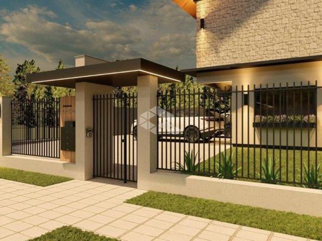 Casa geminada com 3 suítes mais lavabo próximo ao centro de Canela