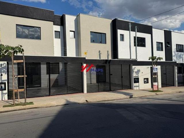 Casa geminada com três quartos, suíte e duas vagas de garagem no bairro Itapoã Belo Horizonte/MG