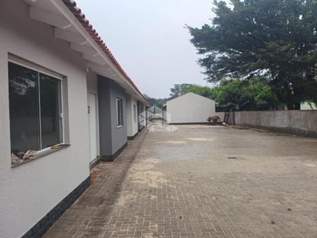 CASA GEMINADA COM DOIS DORMITÓRIOS EM VIAMÃO