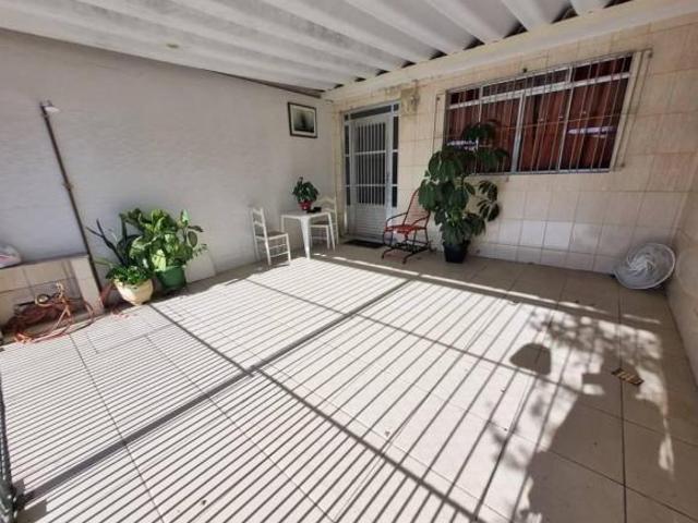 Casa geminada com Edícula no Caiçara