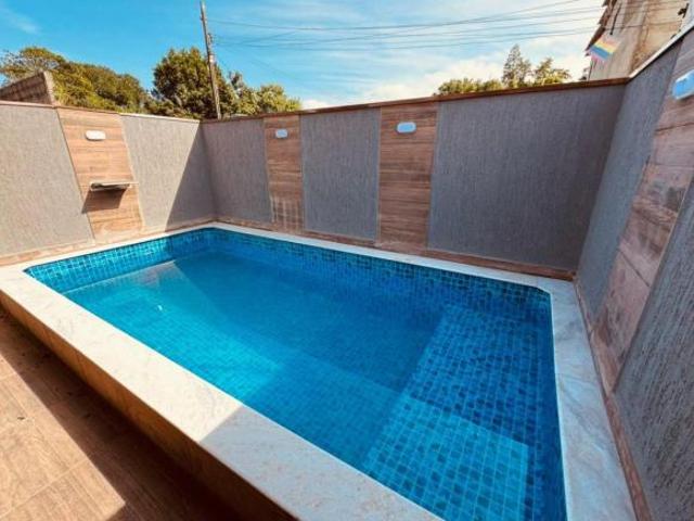Casa Geminada com Piscina e Suíte a Apenas 560 Metros da Praia no Gaivota – Pronta para Morar