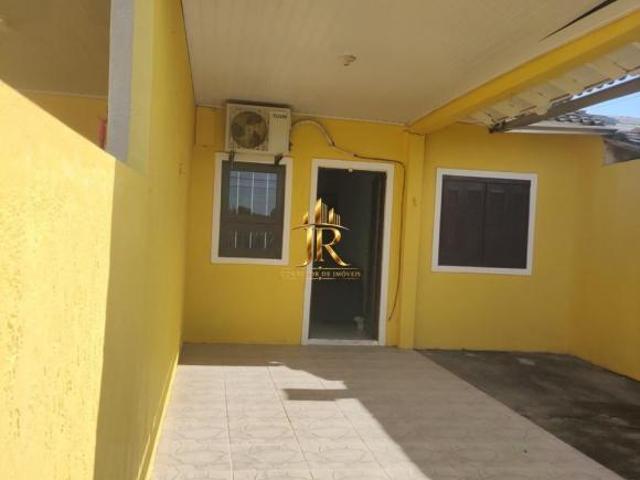 Casa geminada com piscina em bairro de moradores em Tramandaí