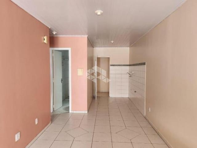 Casa Geminada de 2 dormitórios no Bairro Arroio Grande!