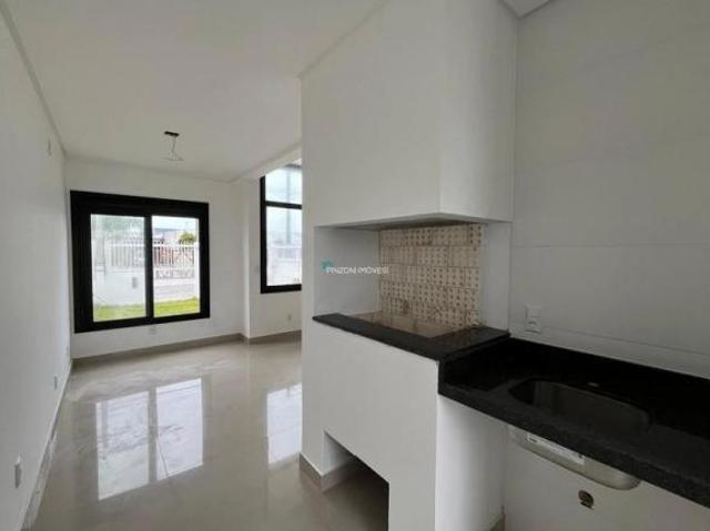 Casa geminada em Atlântida Sul, próxima da praia