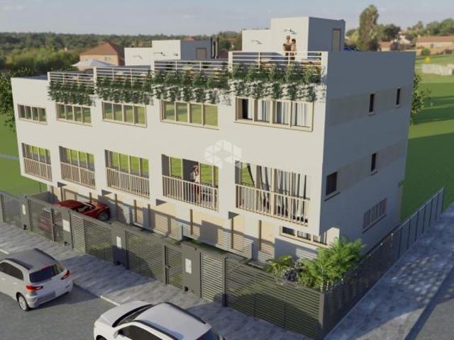 Casa geminada em construção no bairro Vinhedos, Caxias do Sul