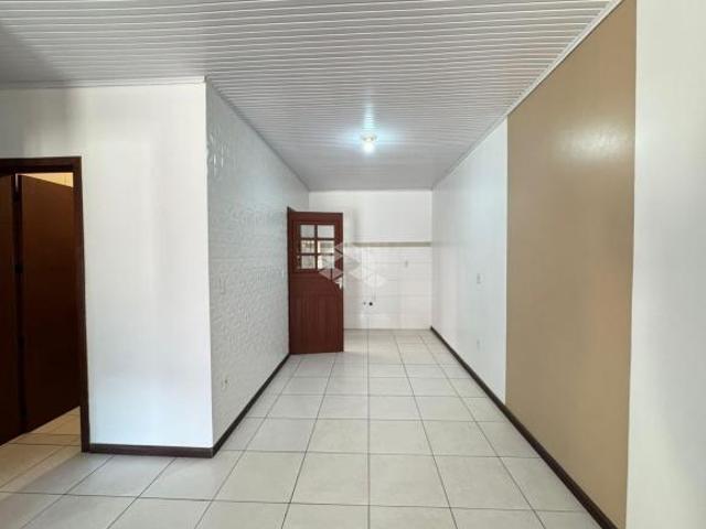 Casa geminada 02 dormitórios no Bairro Arroio Grande!
