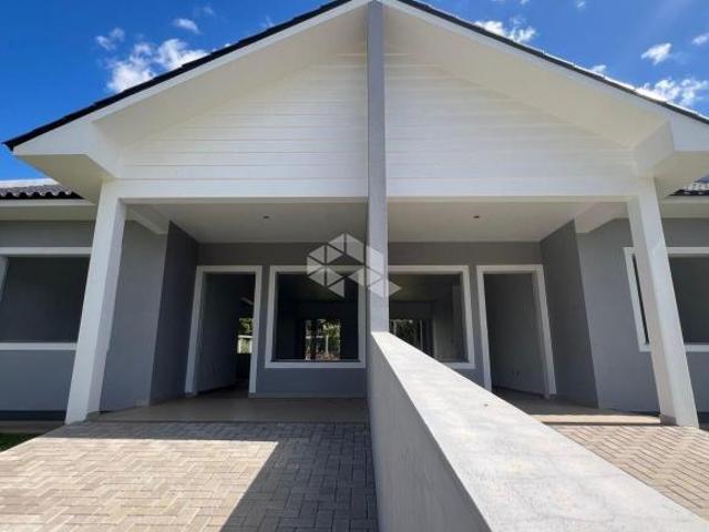 Casa geminada 02 dormitórios, com pátio, em Santa Cruz do Sul