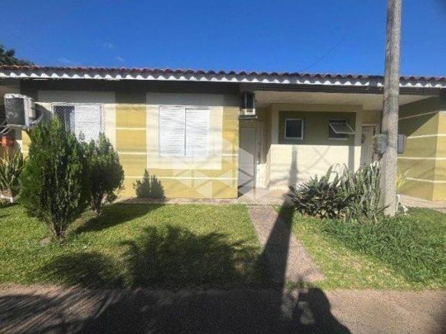 Casa geminada 02 dormitórios em condominio fechado