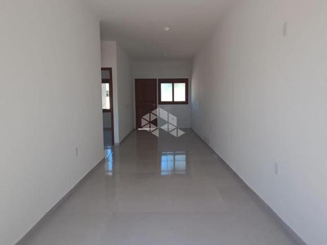 Casa Geminada 2 dormitórios, nunca habitada na praia de Atlântida Sul em Osório/RS