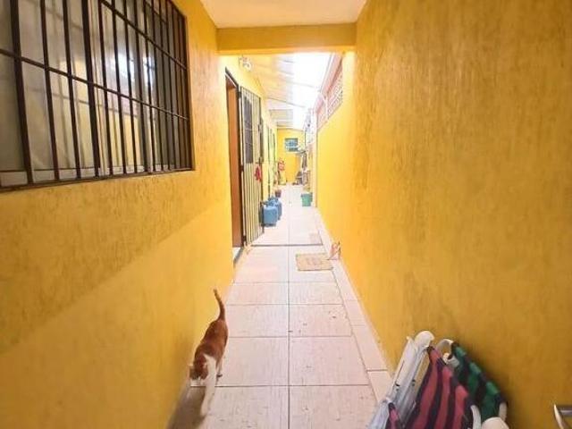 Casa geminada 2 quartos, 1 suíte, Vila Caiçara 70 metros do mar