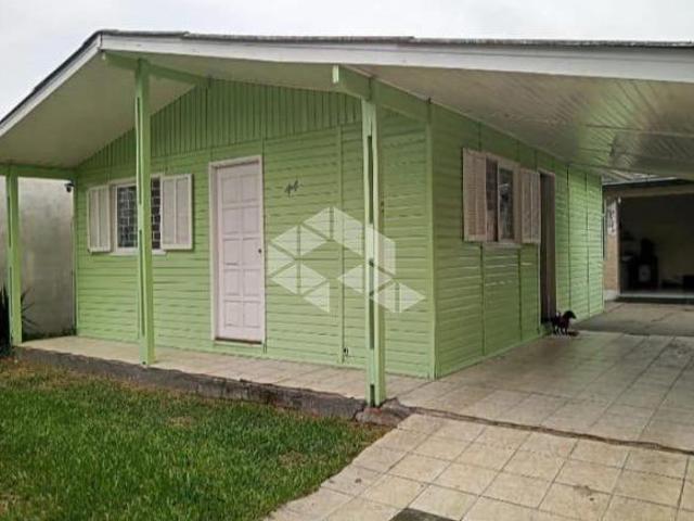 Casa harmonia 2 dormitórios, 2 vagas, 2 vagas cobertas com lavanderia nos fundos