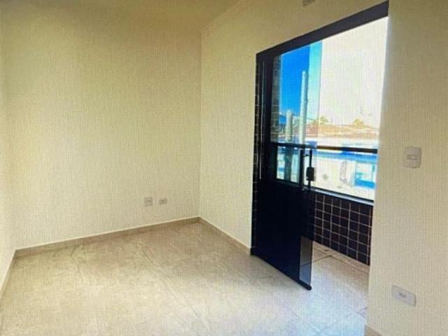 Casa individual no Caiçara, Praia Grande, 2 quartos, 2 vagas, com sacada, 56m²