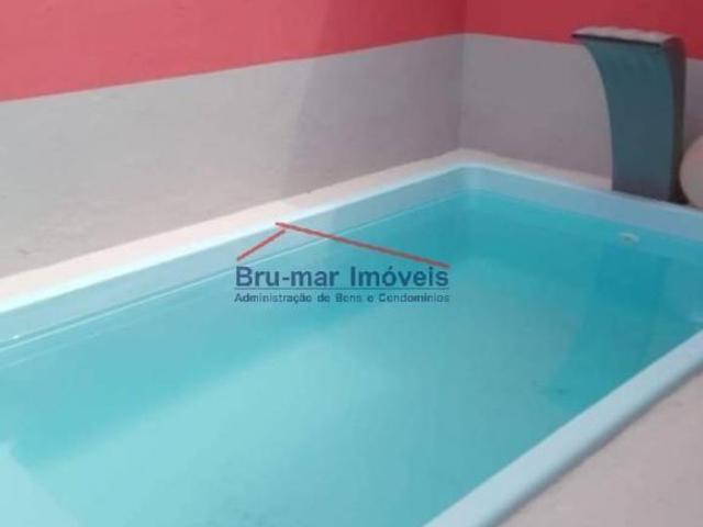 Casa isolada de um lado, 2 dormitórios 1 suíte, Ocian, 2 vagas, piscina
