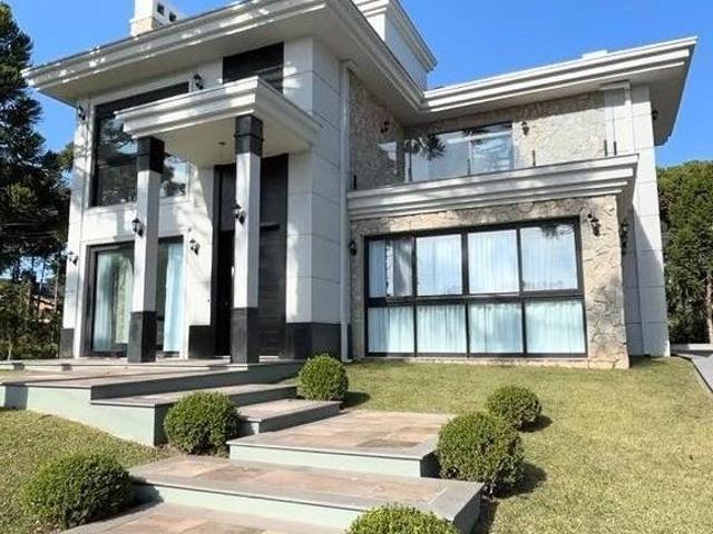 Casa Luxuosa com 5 Suítes no Cond. Aspen Mountain