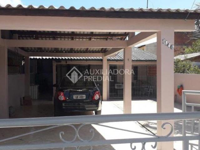 Casa localizada em bairro tranquilo