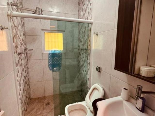 casa lote inteiro com piscina e edícula a venda em Itanhaem