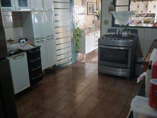 Casa Padrão para Venda com 04 Dormitórios no bairro Vila Itália