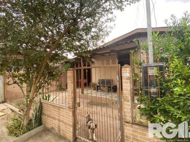 Casa para compra ou troca em Porto Alegre/RS | Casa com 4 dormitórios, 2 banheiros, 2 salas, cozinha