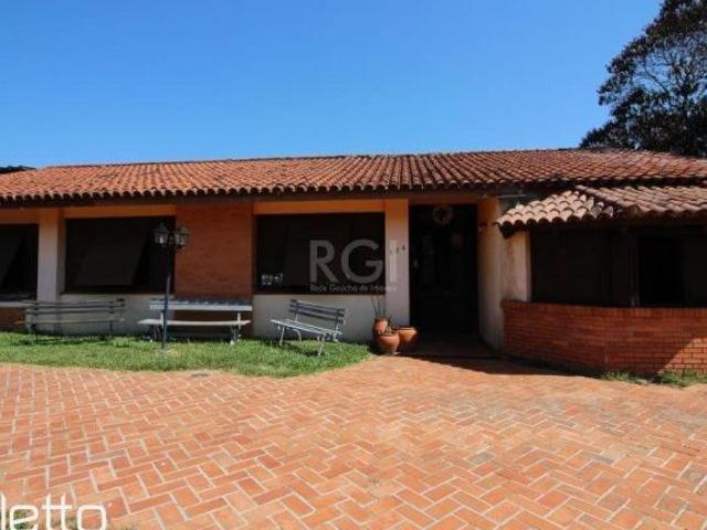 Casa para comprar com 5 dormitórios e vaga para 7 carros no Vila Assunção