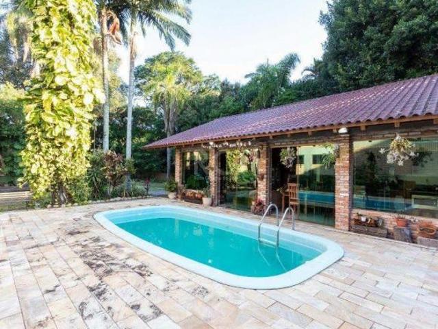 Casa para Venda 292.21m², 4 dormitórios, sendo 2 suites, 3 vagas Tristeza