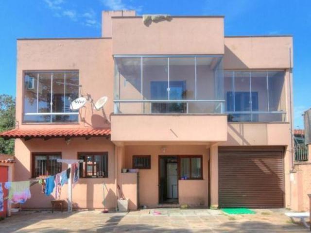 Casa para Venda 323.74m², 3 dormitórios, 6 vagas Tristeza