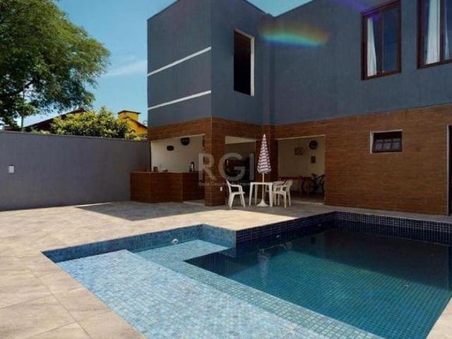 Casa para Venda 400m², 4 dormitórios, sendo 2 suites, 4 vagas Guarujá, Porto Alegre
