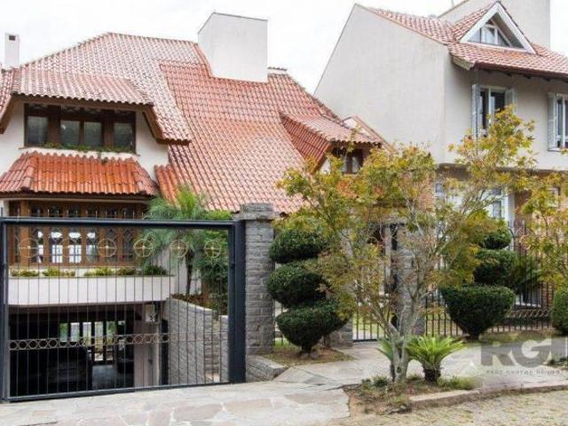 Casa para Venda com 4 dormitórios, sendo 2 suites e 4 vagas no bairro Jardim Isabel