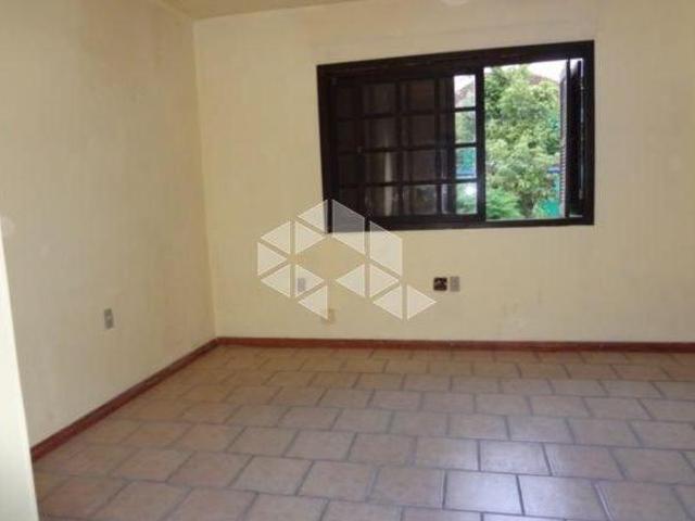 Casa para venda de 3 dormitórios sendo 1 suíte no bairro Partenon em Porto Alegre