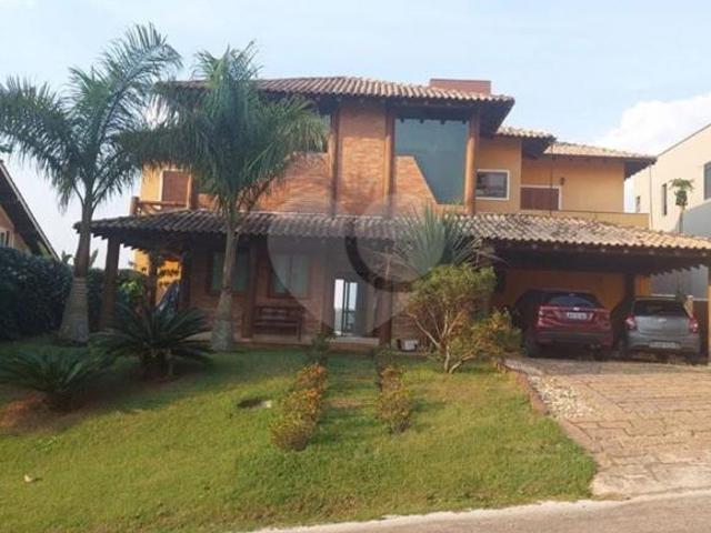 Casa para venda e aluguel em Serra Dos Lagos de 350.00m² com 5 Quartos, 4 Suites e 4 Garagens