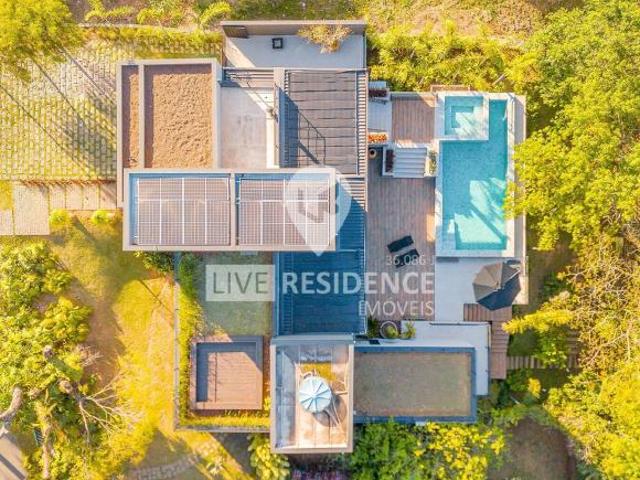 Casa para venda em Condominio Village Das Palmeiras de 440.00m² com 4 Quartos, 3 Suites e 4 Garagens