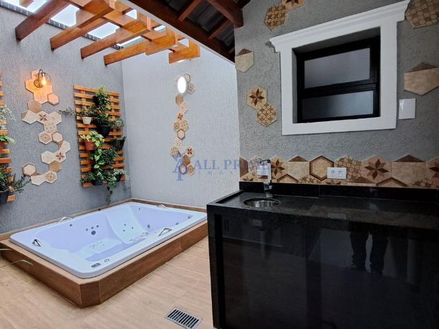 Casa para venda em Caiçara em Praia Grande São Paulo de 116.00m² com 3 Quartos, 2 Suítes e 2 Garagens