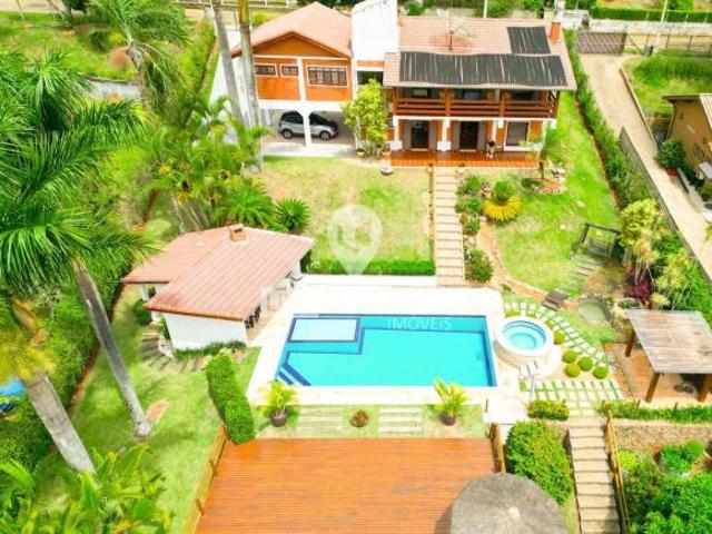 Casa para venda em Capela Do Barreiro de 498.00m² com 4 Quartos, 2 Suites e 5 Garagens