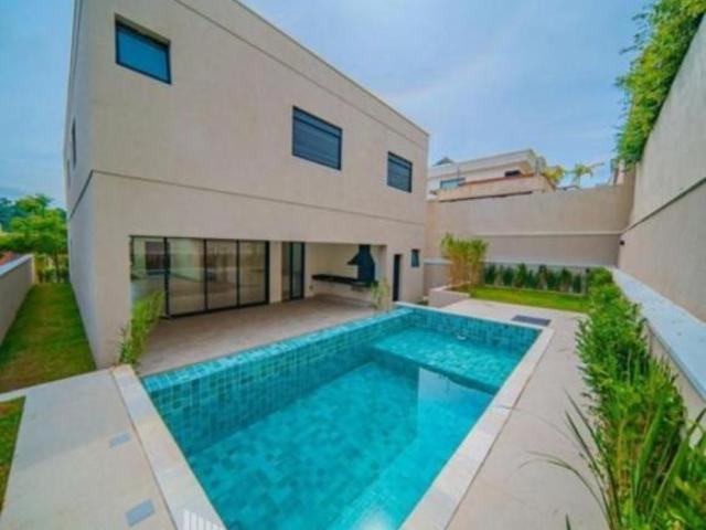 Casa para venda em Cidade Tamboré de 385.00m² com 4 Quartos, 4 Suites e 6 Garagens