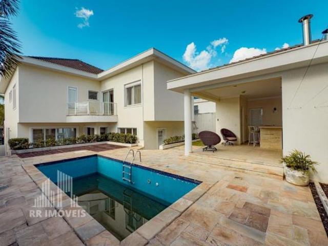 Casa para venda em Alphaville de 440.00m² com 4 Quartos, 4 Suites e 6 Garagens