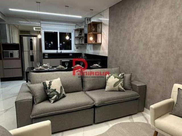 Casa para venda em Guilhermina de 88.00m² com 2 Quartos, 2 Suites e 2 Garagens