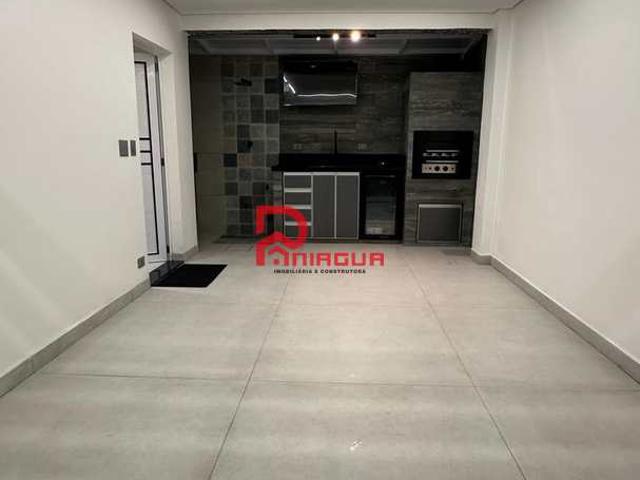 Casa para venda em Guilhermina em Praia Grande São Paulo de 88.00m² com 2 Quartos, 2 Suítes e 2 Garagens