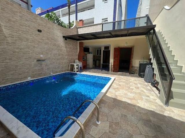 Casa para venda em Guilhermina em Praia Grande São Paulo de 150.00m² com 3 Quartos, 1 Suíte e 2 Garagens