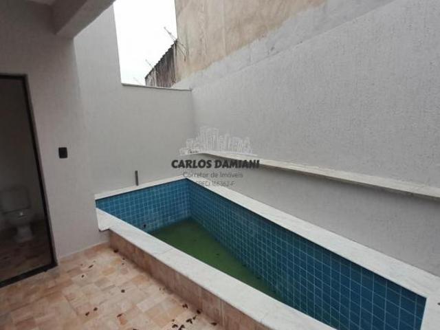 Casa para Venda em Itanhaém, Jardim das Palmeiras, 3 dormitórios, 1 suíte, 2 banheiros, 2 vagas